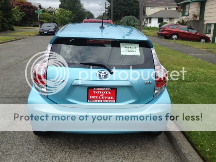 It's FINALLY arrived! My Prius C4 in Summer Rain Metallic! | PriusChat