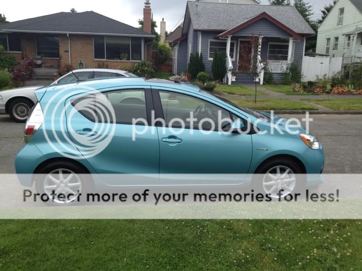 It's FINALLY arrived! My Prius C4 in Summer Rain Metallic! | PriusChat