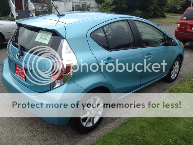 It's FINALLY arrived! My Prius C4 in Summer Rain Metallic! | PriusChat